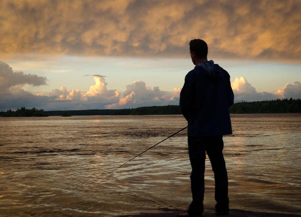 Don Enright reels with memories while fishing in northern Manitoba.
